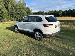 White Skoda Karoq 2025 in Vilnius, with an engine capacity of 1.50 L and mileage of 22 thousand km for 28200 €, photo  on AUTOMOTO.COM.LV