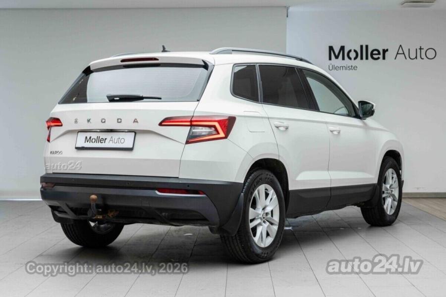 White Skoda Karoq 2020 in Tallinn, with an engine capacity of 2.00 L and mileage of 215 thousand km for 14650 €, photo 6 on AUTOMOTO.COM.LV