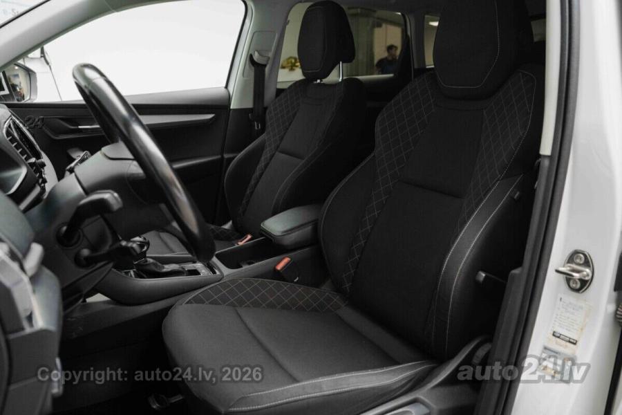 White Skoda Karoq 2020 in Tallinn, with an engine capacity of 2.00 L and mileage of 215 thousand km for 14650 €, photo 13 on AUTOMOTO.COM.LV
