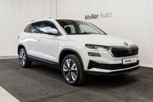 White Skoda Karoq 2024 in Tallinn, with an engine capacity of 2.00 L and mileage of 31 thousand km for 25900 €, photo 5 on AUTOMOTO.COM.LV