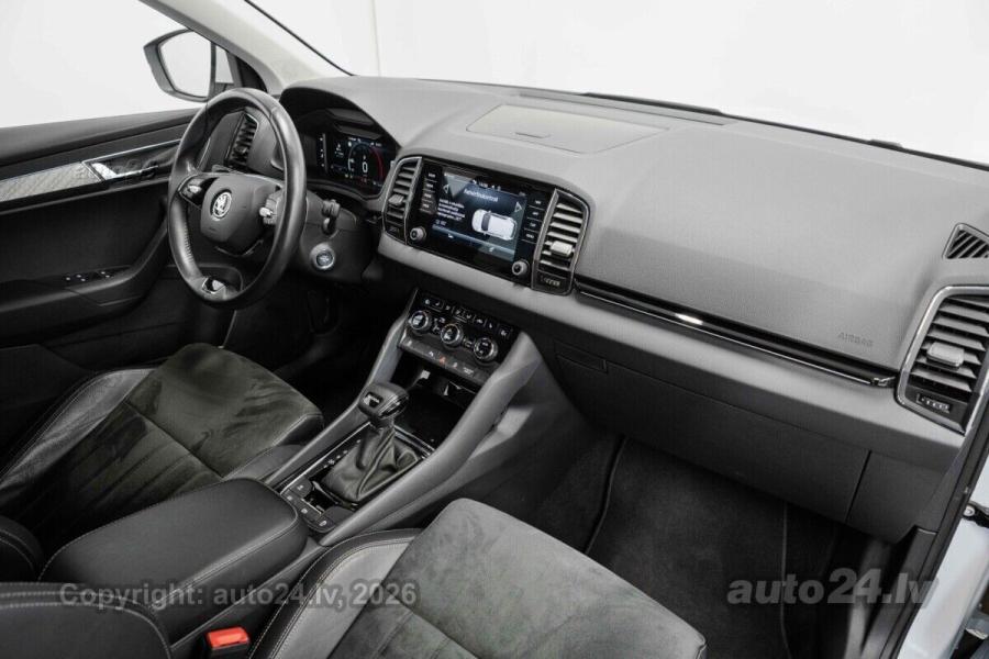 White Skoda Karoq 2024 in Tallinn, with an engine capacity of 2.00 L and mileage of 31 thousand km for 25900 €, photo 8 on AUTOMOTO.COM.LV