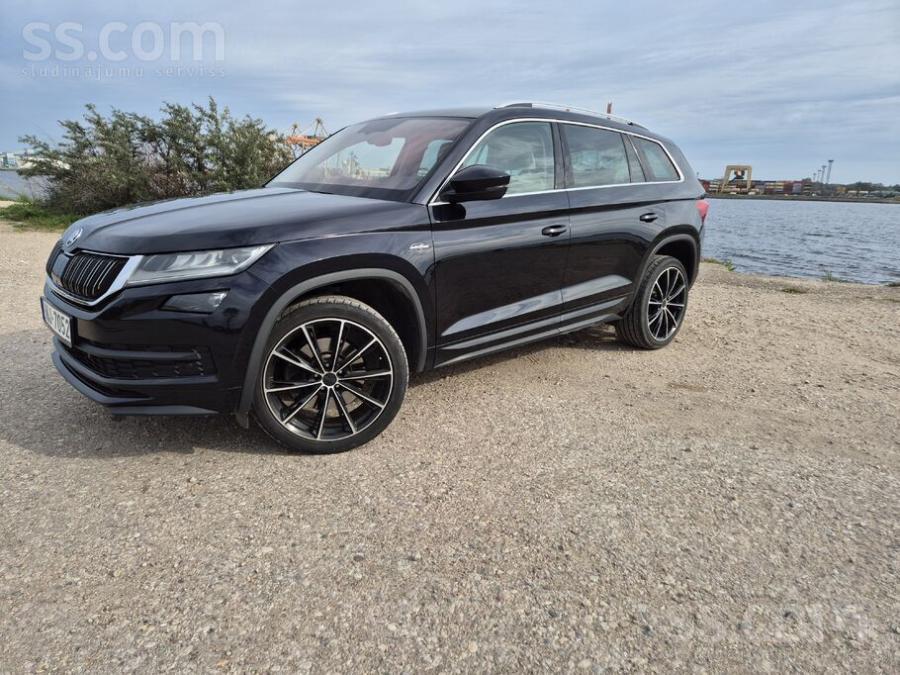 Black Skoda Kodiaq 2019 in Riga, with an engine capacity of 2.00 L and mileage of 158 thousand km for 19600 €, photo 1 on AUTOMOTO.COM.LV