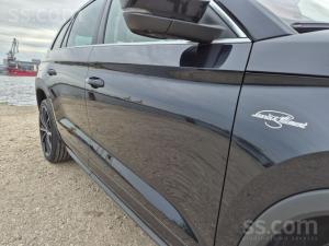 Black Skoda Kodiaq 2019 in Riga, with an engine capacity of 2.00 L and mileage of 158 thousand km for 19600 €, photo 4 on AUTOMOTO.COM.LV
