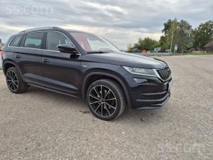 Black Skoda Kodiaq 2019 in Riga, with an engine capacity of 2.00 L and mileage of 158 thousand km for 19600 €, photo 5 on AUTOMOTO.COM.LV