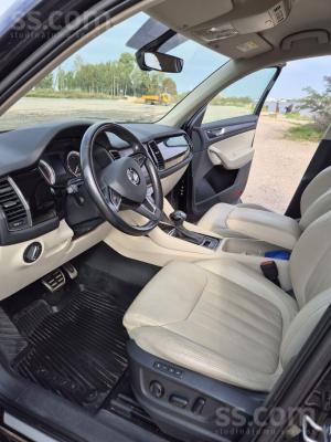 Black Skoda Kodiaq 2019 in Riga, with an engine capacity of 2.00 L and mileage of 158 thousand km for 19600 €, photo 17 on AUTOMOTO.COM.LV