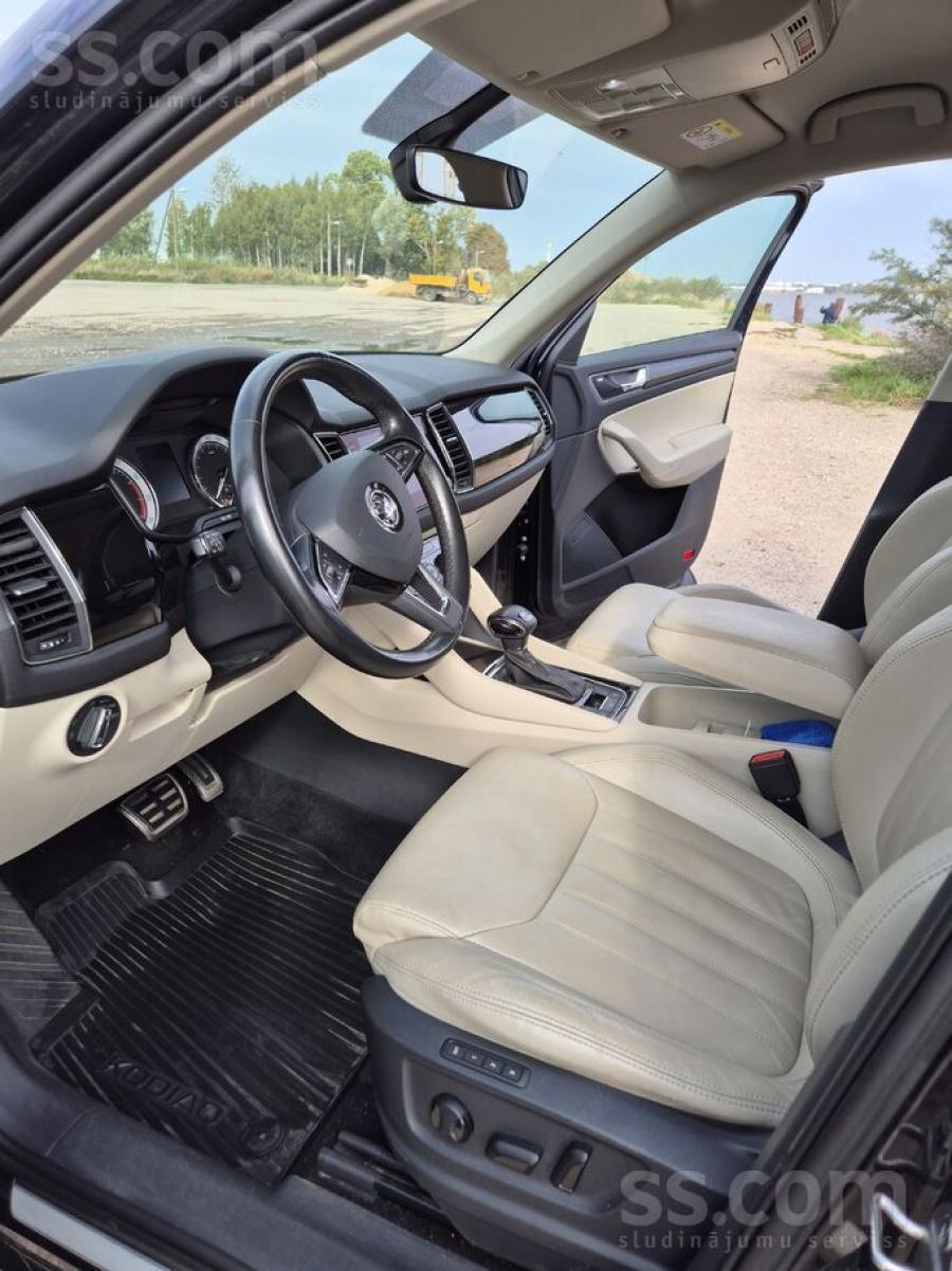 Black Skoda Kodiaq 2019 in Riga, with an engine capacity of 2.00 L and mileage of 158 thousand km for 19600 €, photo 17 on AUTOMOTO.COM.LV
