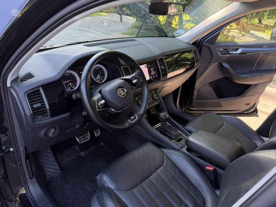 Black Skoda Kodiaq 2021 in Taurage, with an engine capacity of 1.97 L and mileage of 212 thousand km for 22600 €, photo 12 on AUTOMOTO.COM.LV