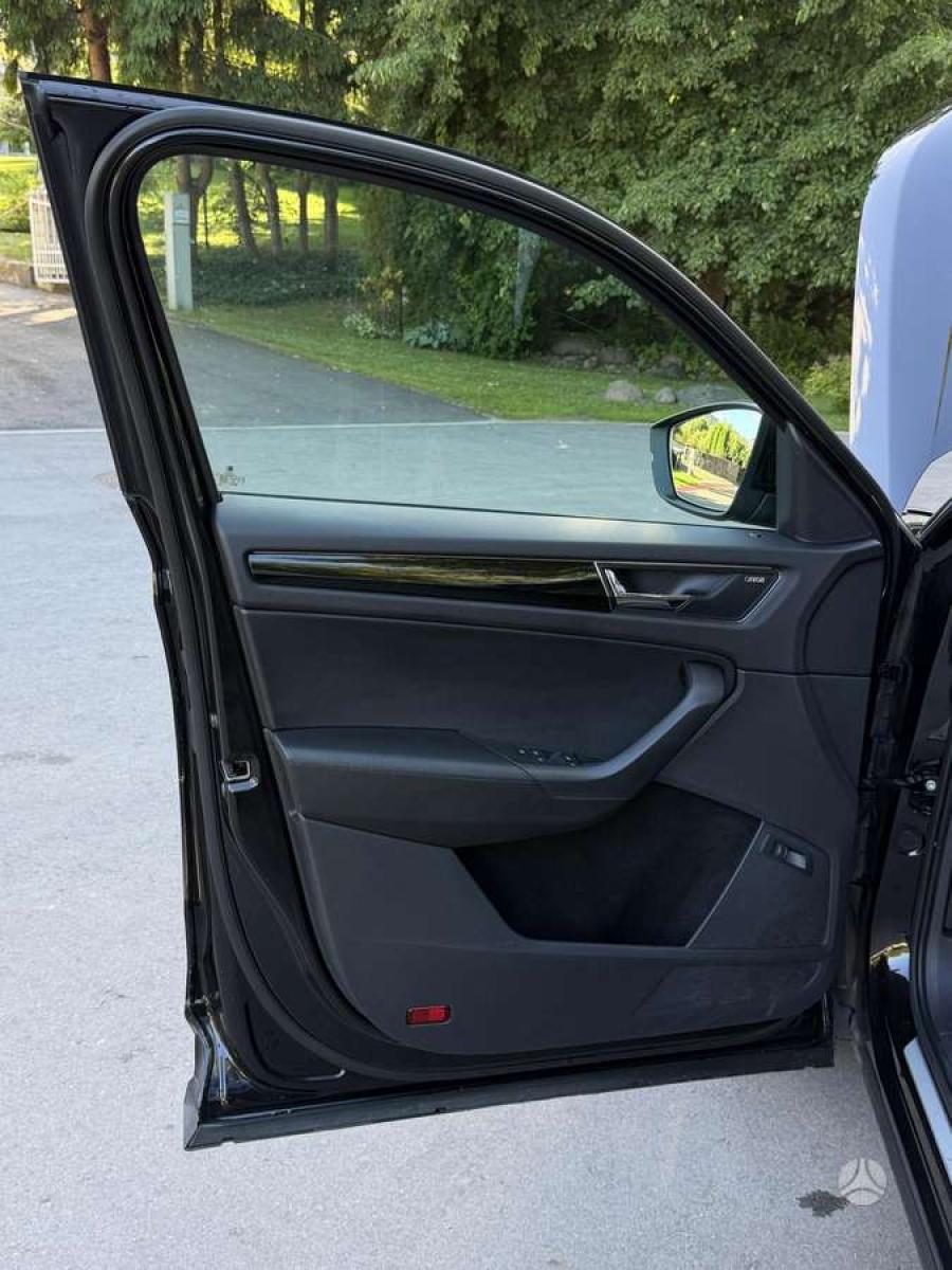 Black Skoda Kodiaq 2021 in Taurage, with an engine capacity of 1.97 L and mileage of 212 thousand km for 22600 €, photo 23 on AUTOMOTO.COM.LV