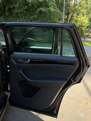 Black Skoda Kodiaq 2021 in Taurage, with an engine capacity of 1.97 L and mileage of 212 thousand km for 22600 €, photo 24 on AUTOMOTO.COM.LV