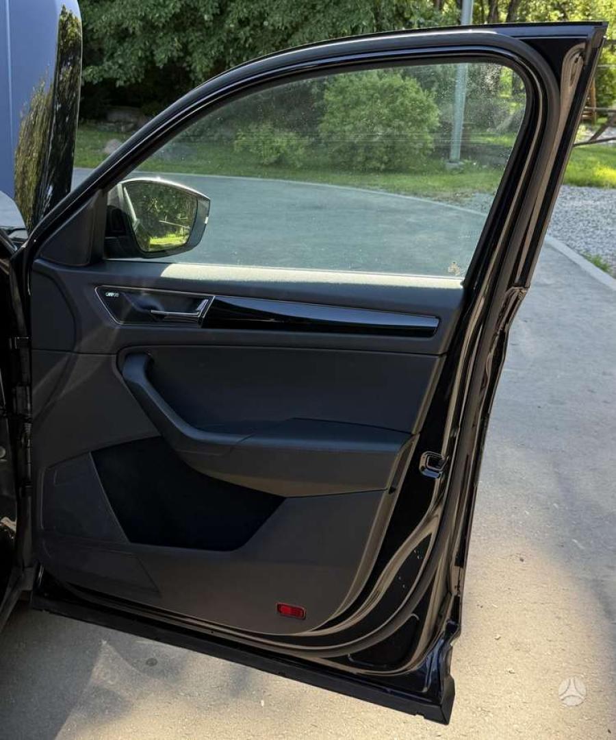 Black Skoda Kodiaq 2021 in Taurage, with an engine capacity of 1.97 L and mileage of 212 thousand km for 22600 €, photo 26 on AUTOMOTO.COM.LV