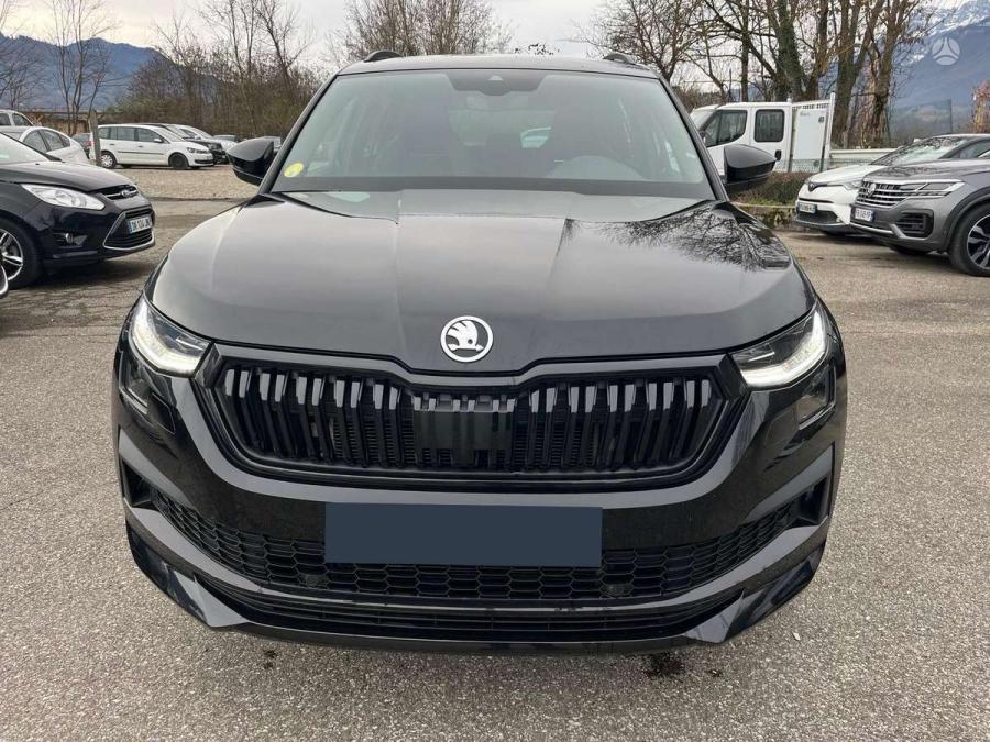 Black Skoda Kodiaq 2022 in Kaunas, with an engine capacity of 2.00 L and mileage of 157 thousand km for 26800 €, photo 4 on AUTOMOTO.COM.LV