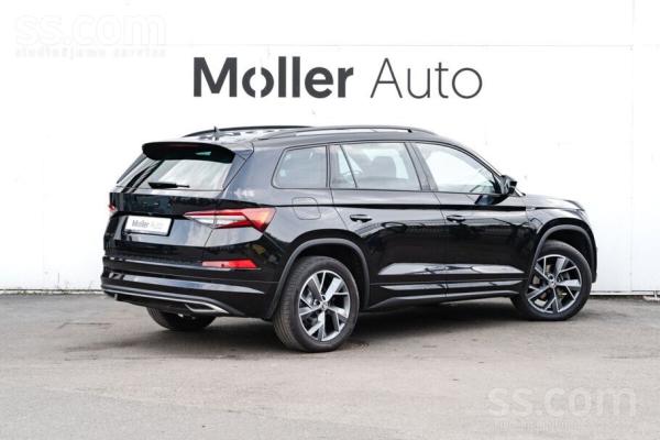 Black Skoda Kodiaq 2022 in Riga, with an engine capacity of 2.00 L and mileage of 160 thousand km for 27950 €, photo 4 on AUTOMOTO.COM.LV