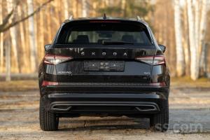 Black Skoda Kodiaq 2022 in Riga, with an engine capacity of 2.00 L and mileage of 195 thousand km for 25890 €, photo 6 on AUTOMOTO.COM.LV