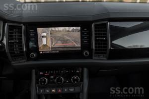 Black Skoda Kodiaq 2022 in Riga, with an engine capacity of 2.00 L and mileage of 195 thousand km for 25890 €, photo 19 on AUTOMOTO.COM.LV