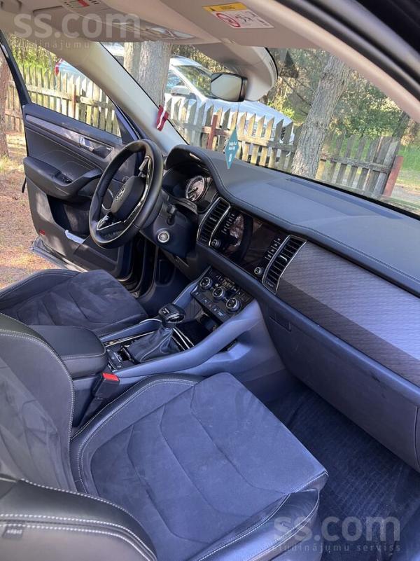 Black Skoda Kodiaq 2022 in Riga, with an engine capacity of 2.00 L and mileage of 89 thousand km for 30550 €, photo 6 on AUTOMOTO.COM.LV