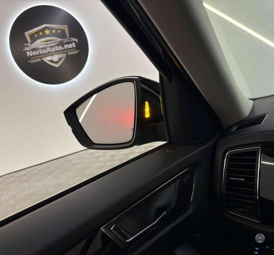 Black Skoda Kodiaq 2022 in Marijampole, with an engine capacity of 1.97 L and mileage of 139 thousand km for 28999 €, photo 4 on AUTOMOTO.COM.LV