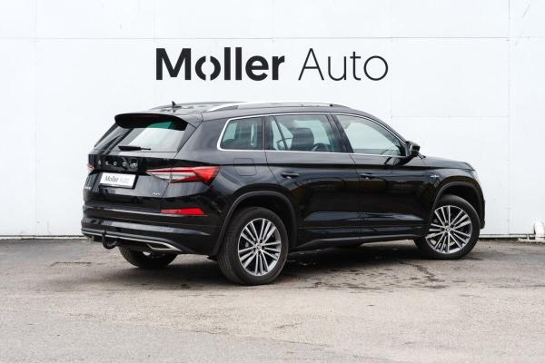Skoda Kodiaq 2022 in Riga on AUTOMOTO.COM.LV Black Skoda Kodiaq 2022 in Riga, with an engine capacity of 2.00 L and mileage of 93 thousand km for 32500 €, photo 5 on AUTOMOTO.COM.LV