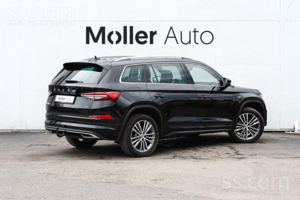 Black Skoda Kodiaq 2022 in Riga, with an engine capacity of 2.00 L and mileage of 93 thousand km for 32500 €, photo 5 on AUTOMOTO.COM.LV