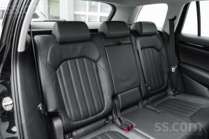Black Skoda Kodiaq 2022 in Riga, with an engine capacity of 2.00 L and mileage of 93 thousand km for 31350 €, photo 12 on AUTOMOTO.COM.LV