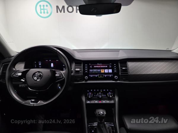 Skoda Kodiaq 2022 in Tallinn on AUTOMOTO.COM.LV Black Skoda Kodiaq 2022 in Tallinn, with an engine capacity of 2.00 L and mileage of 137 thousand km for 26900 €, photo 9 on AUTOMOTO.COM.LV