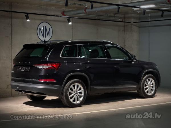 Skoda Kodiaq 2022 in Tallinn on AUTOMOTO.COM.LV Black Skoda Kodiaq 2022 in Tallinn, with an engine capacity of 2.00 L and mileage of 128 thousand km for 25990 €, photo 3 on AUTOMOTO.COM.LV