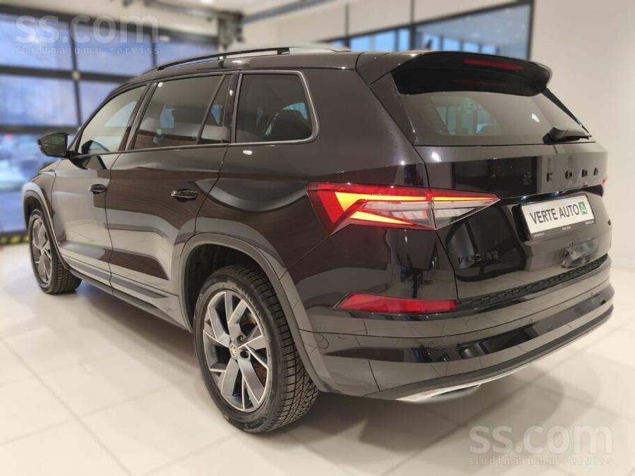 Black Skoda Kodiaq 2023 in Riga, with an engine capacity of 2.00 L and mileage of 19 thousand km for 34990 €, photo 6 on AUTOMOTO.COM.LV