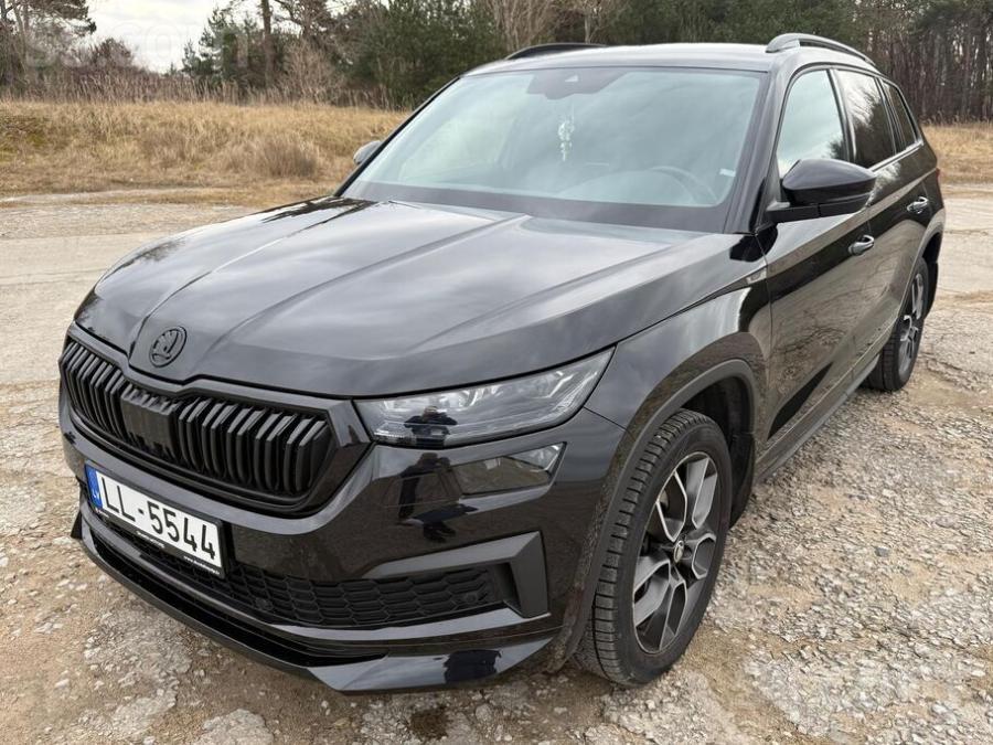 Black Skoda Kodiaq 2023 in Liepaja, with an engine capacity of 2.00 L and mileage of 89 thousand km for 35900 €, photo 5 on AUTOMOTO.COM.LV