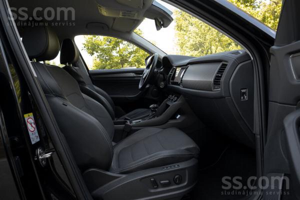 Black Skoda Kodiaq 2023 in Riga, with an engine capacity of 2.00 L and mileage of 222 thousand km for 23300 €, photo 4 on AUTOMOTO.COM.LV