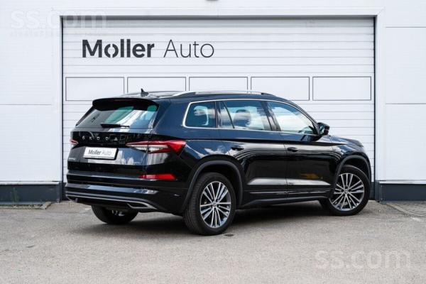 Black Skoda Kodiaq 2023 in Riga, with an engine capacity of 2.00 L and mileage of 116 thousand km for 31950 €, photo 4 on AUTOMOTO.COM.LV