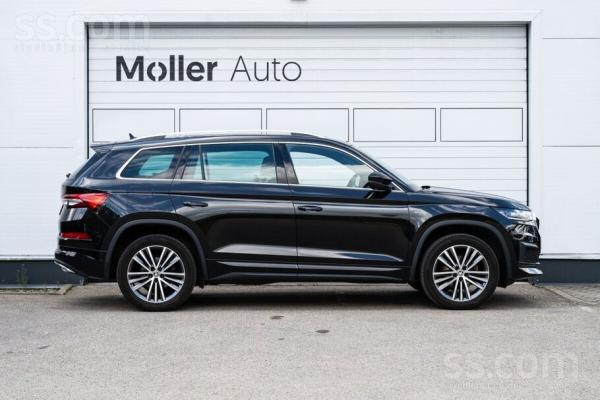 Black Skoda Kodiaq 2023 in Riga, with an engine capacity of 2.00 L and mileage of 116 thousand km for 31950 €, photo 5 on AUTOMOTO.COM.LV