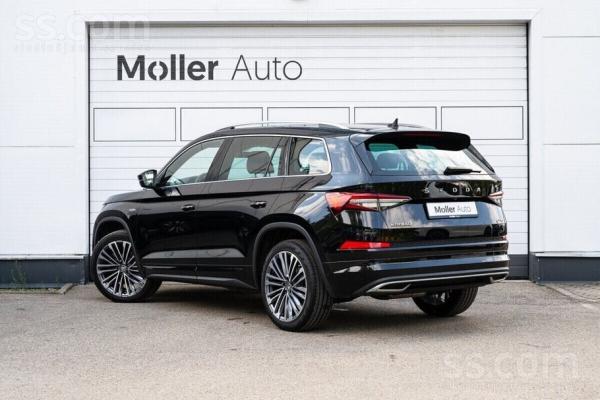 Black Skoda Kodiaq 2023 in Riga, with an engine capacity of 2.00 L and mileage of 132 thousand km for 32650 €, photo 5 on AUTOMOTO.COM.LV