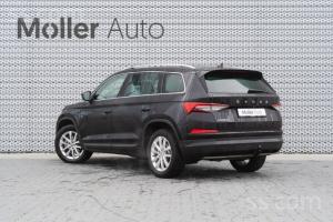 Black Skoda Kodiaq 2023 in Riga, with an engine capacity of 1.50 L and mileage of 125 thousand km for 28650 €, photo 4 on AUTOMOTO.COM.LV