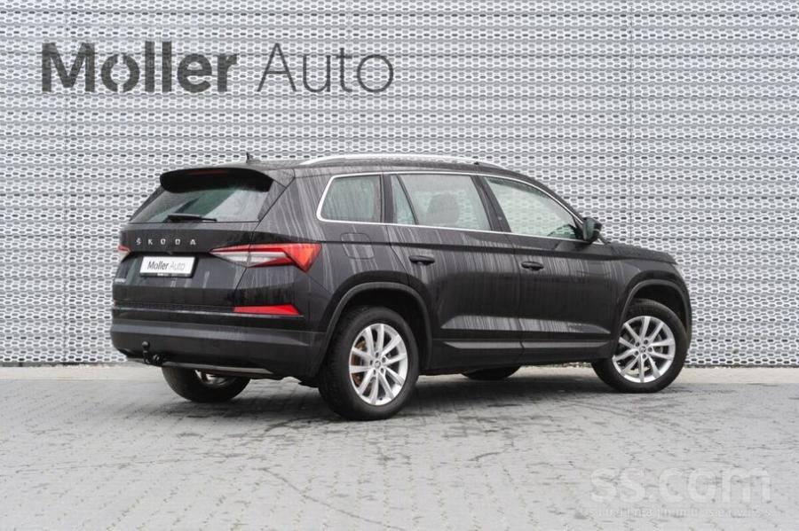 Black Skoda Kodiaq 2023 in Riga, with an engine capacity of 1.50 L and mileage of 125 thousand km for 28650 €, photo 5 on AUTOMOTO.COM.LV