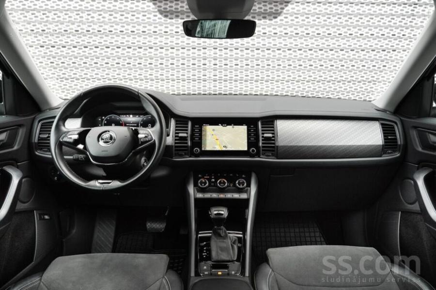Black Skoda Kodiaq 2023 in Riga, with an engine capacity of 1.50 L and mileage of 125 thousand km for 28650 €, photo 7 on AUTOMOTO.COM.LV