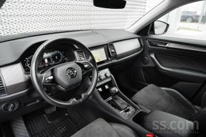 Black Skoda Kodiaq 2023 in Riga, with an engine capacity of 1.50 L and mileage of 125 thousand km for 28650 €, photo 12 on AUTOMOTO.COM.LV
