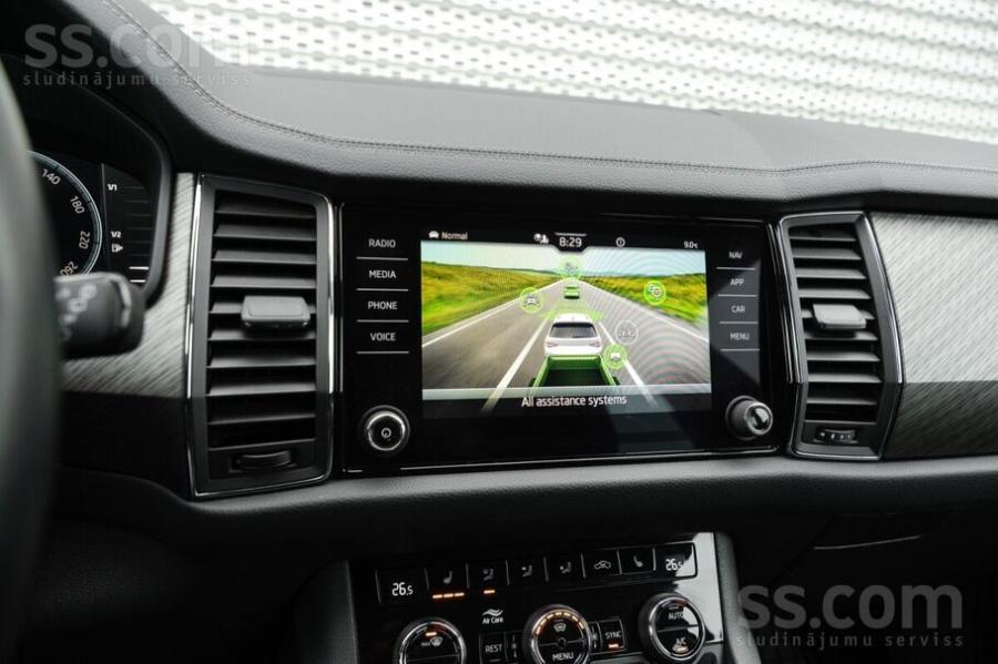 Black Skoda Kodiaq 2023 in Riga, with an engine capacity of 1.50 L and mileage of 125 thousand km for 28650 €, photo 19 on AUTOMOTO.COM.LV