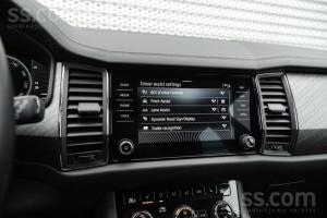 Black Skoda Kodiaq 2023 in Riga, with an engine capacity of 1.50 L and mileage of 125 thousand km for 28650 €, photo 20 on AUTOMOTO.COM.LV