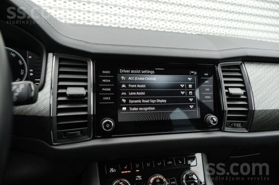 Black Skoda Kodiaq 2023 in Riga, with an engine capacity of 1.50 L and mileage of 125 thousand km for 28650 €, photo 20 on AUTOMOTO.COM.LV