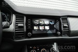 Black Skoda Kodiaq 2023 in Riga, with an engine capacity of 1.50 L and mileage of 125 thousand km for 28650 €, photo 21 on AUTOMOTO.COM.LV