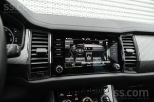 Black Skoda Kodiaq 2023 in Riga, with an engine capacity of 1.50 L and mileage of 125 thousand km for 28650 €, photo 22 on AUTOMOTO.COM.LV