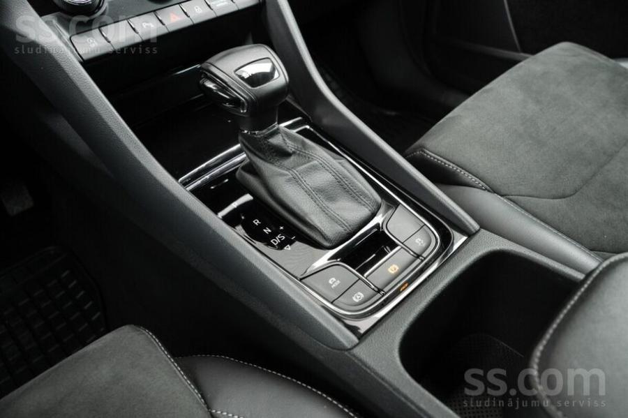 Black Skoda Kodiaq 2023 in Riga, with an engine capacity of 1.50 L and mileage of 125 thousand km for 28650 €, photo 26 on AUTOMOTO.COM.LV