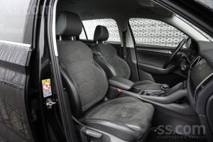 Black Skoda Kodiaq 2023 in Riga, with an engine capacity of 1.50 L and mileage of 125 thousand km for 28650 €, photo 27 on AUTOMOTO.COM.LV