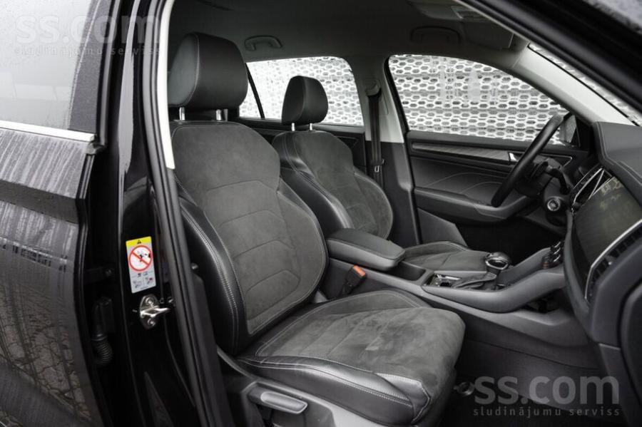 Black Skoda Kodiaq 2023 in Riga, with an engine capacity of 1.50 L and mileage of 125 thousand km for 28650 €, photo 27 on AUTOMOTO.COM.LV