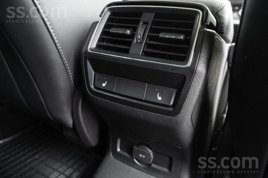 Black Skoda Kodiaq 2023 in Riga, with an engine capacity of 1.50 L and mileage of 125 thousand km for 28650 €, photo 29 on AUTOMOTO.COM.LV
