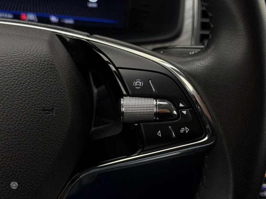 Blue Skoda Kodiaq 2023 in Vilnius, with an engine capacity of 1.98 L and mileage of 95 thousand km for 34700 €, photo 23 on AUTOMOTO.COM.LV