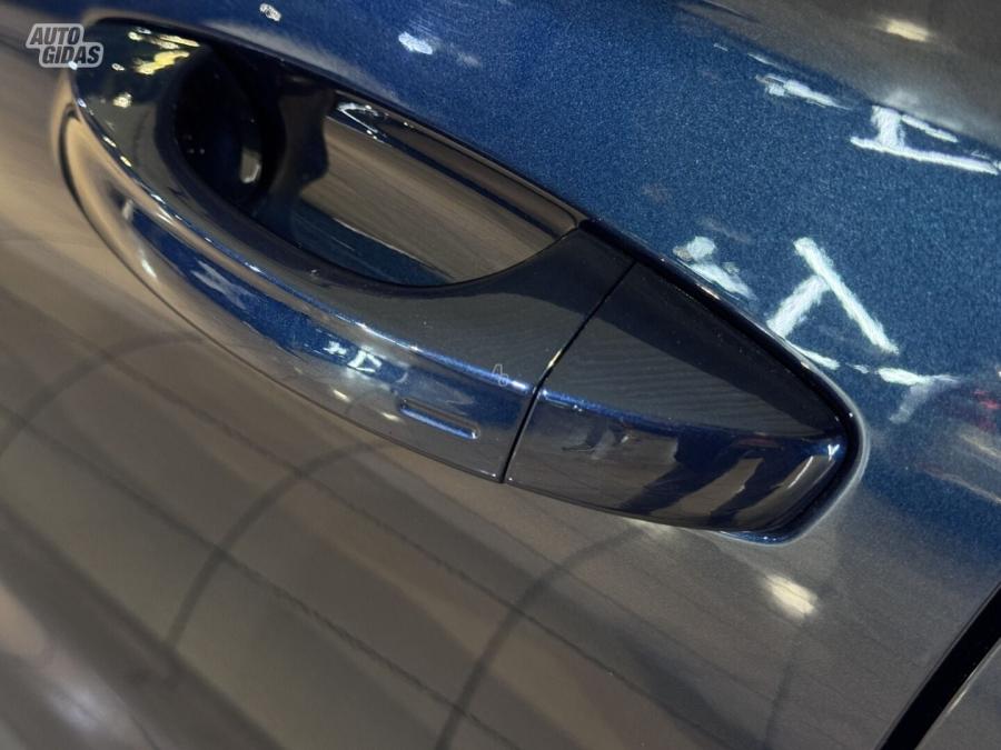Blue Skoda Kodiaq 2024 in Avizieniai, with an engine capacity of 2.00 L and mileage of 83 thousand km for 32950 €, photo 7 on AUTOMOTO.COM.LV