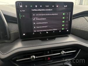 Brown Skoda Kodiaq 2024 in Riga, with an engine capacity of 2.00 L and mileage of 83 thousand km for 33500 €, photo 30 on AUTOMOTO.COM.LV