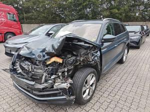 Grey Skoda Kodiaq 2017 in Kaunas, with an engine capacity of 1.97 L and mileage of 217 thousand km for 6999 €, photo 1 on AUTOMOTO.COM.LV
