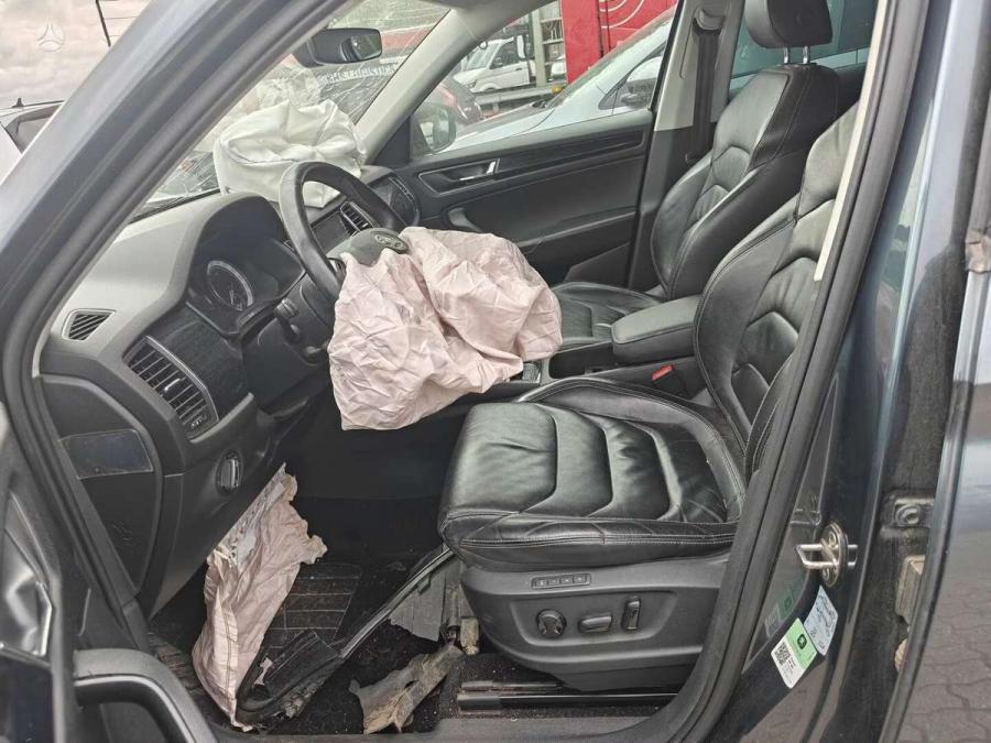 Grey Skoda Kodiaq 2017 in Kaunas, with an engine capacity of 1.97 L and mileage of 217 thousand km for 6999 €, photo 14 on AUTOMOTO.COM.LV