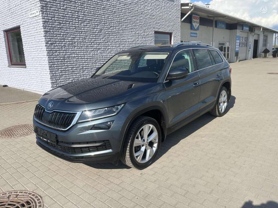 Grey Skoda Kodiaq 2018 in Marijampole, with an engine capacity of 1.97 L and mileage of 211 thousand km for 16900 €, photo 1 on AUTOMOTO.COM.LV